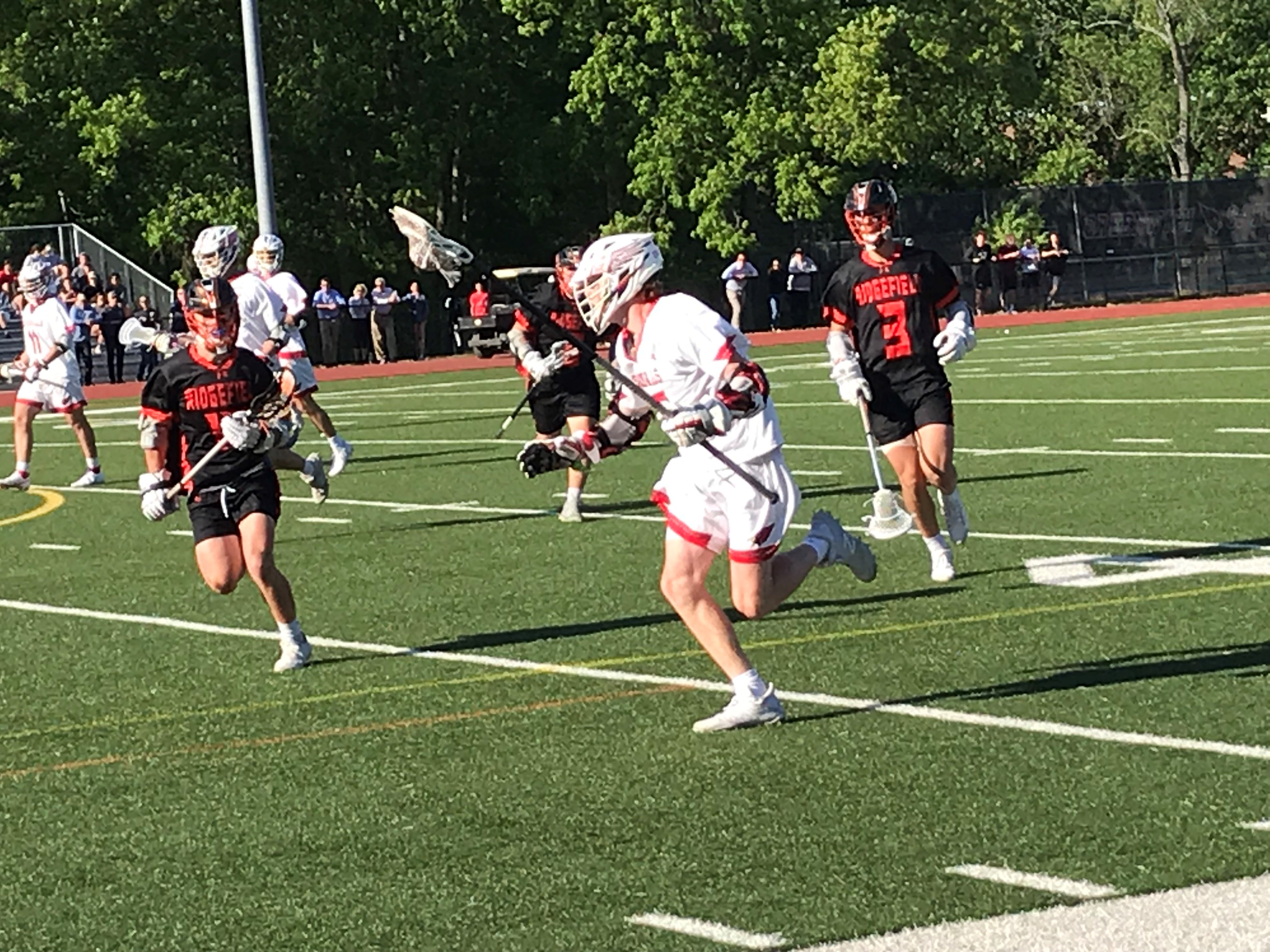 Ridgefield downs Greenwich in FCIAC boys lacrosse tournament ...