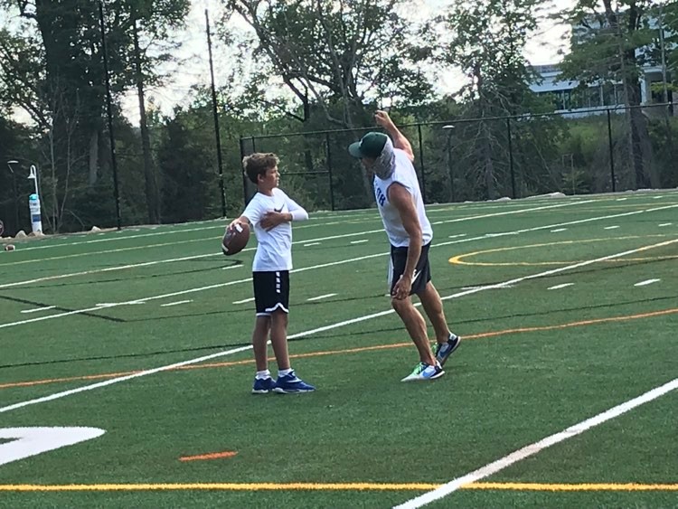 Former NFL quarterbacks Phil, Chris and Matt Simms combined their Simms ...