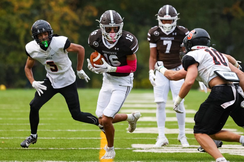 Brunswick football team reigns in the rain against Suffield Academy on ...