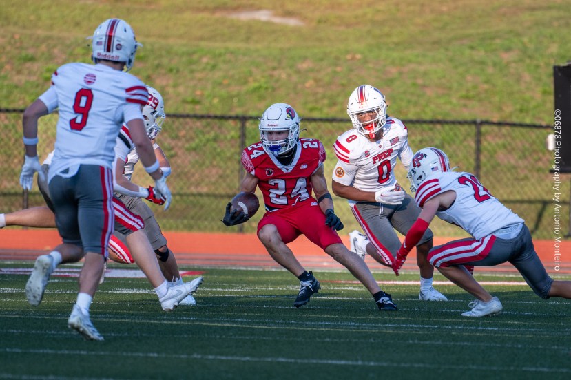 Greenwich High School football team opens season with impressive ...