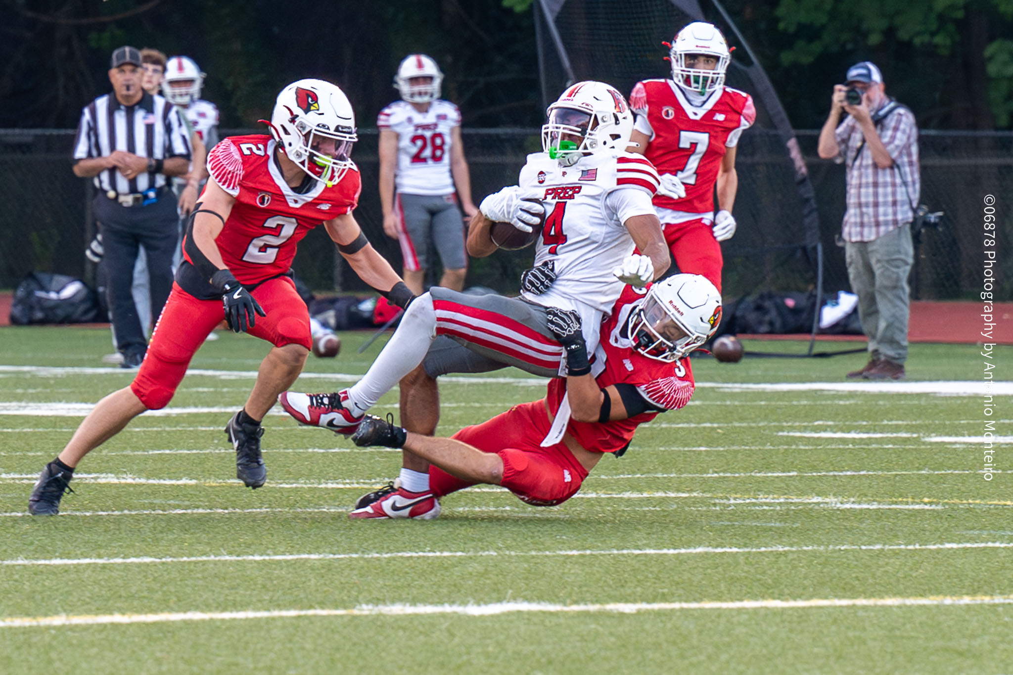 Greenwich High School football team opens season with impressive ...